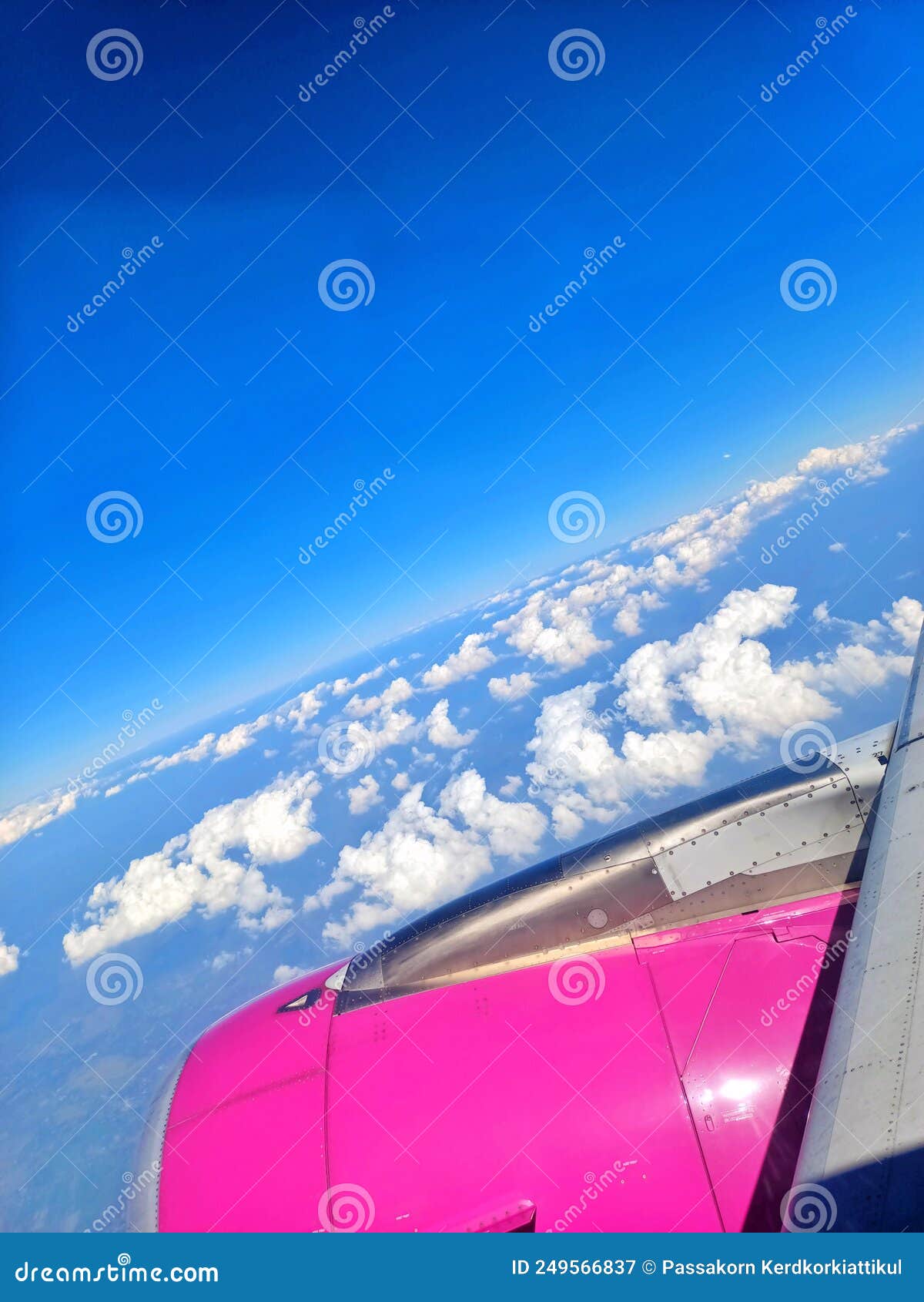 In the sky with pink plane stock image. Image of reflection - 249566837