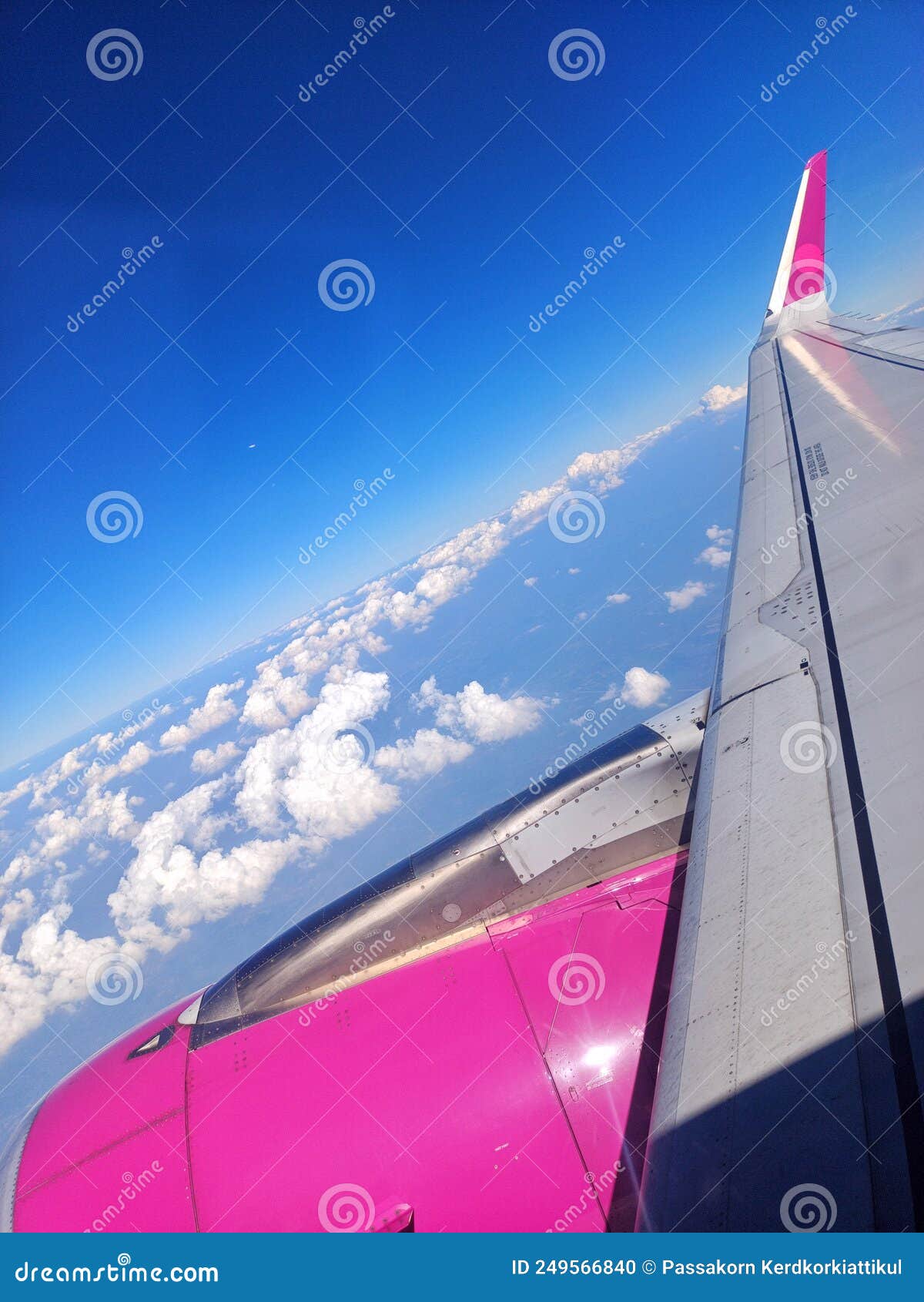 In the sky with pink plane stock photo. Image of blue - 249566840