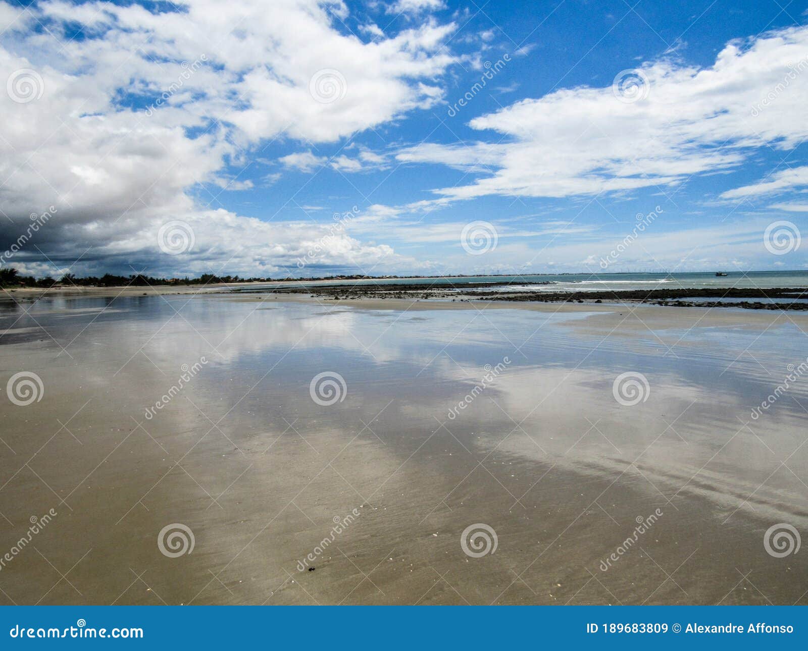 Sky reflection on beach stock image. Image of reflection - 189683809