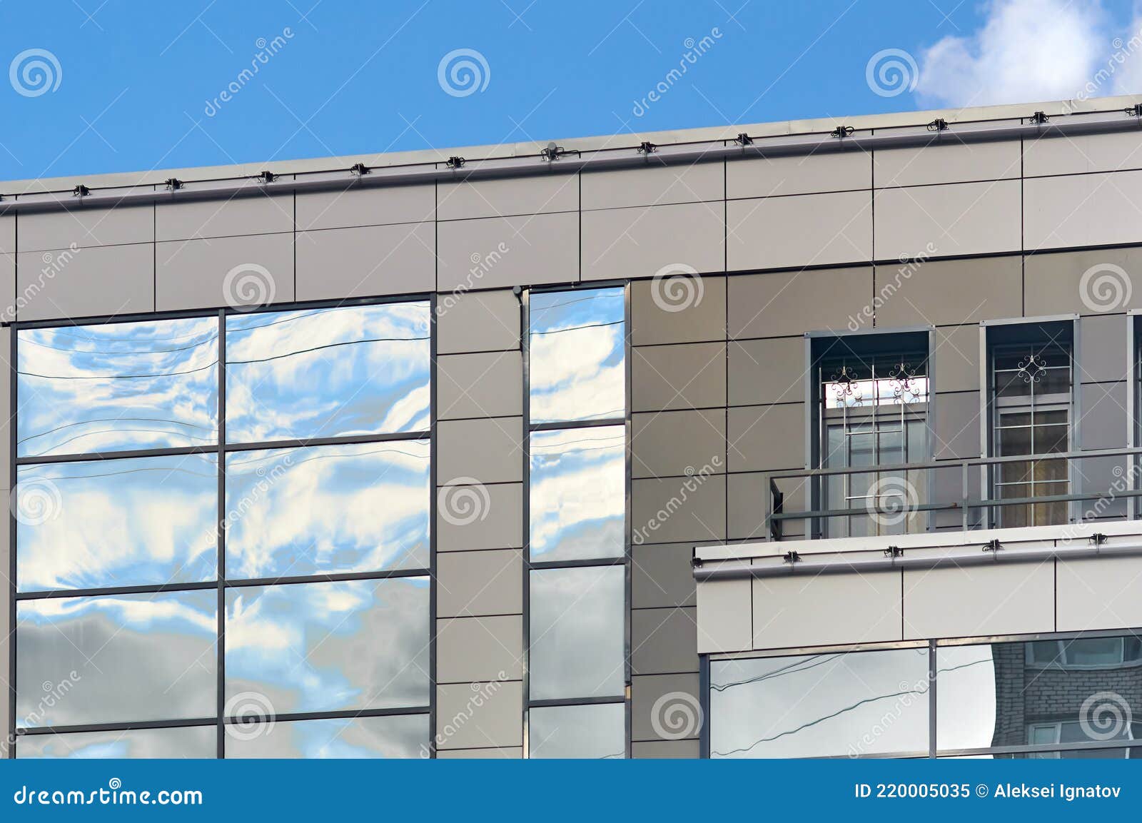 Sky Reflection with Clouds on the Windows of the Building. Stock Image ...