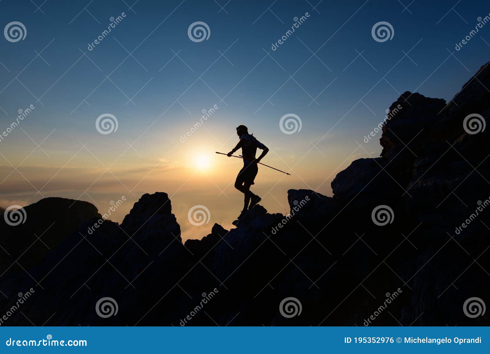 Sky Runner in Silhouette at Sunset among the Rocks Stock Photo - Image ...