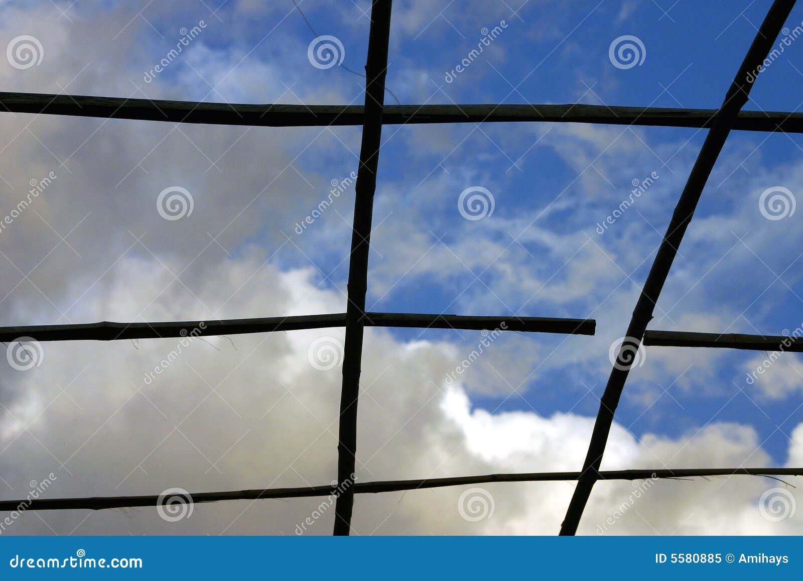 Sky seen through grid stock image. Image of clouds, blue - 5580885