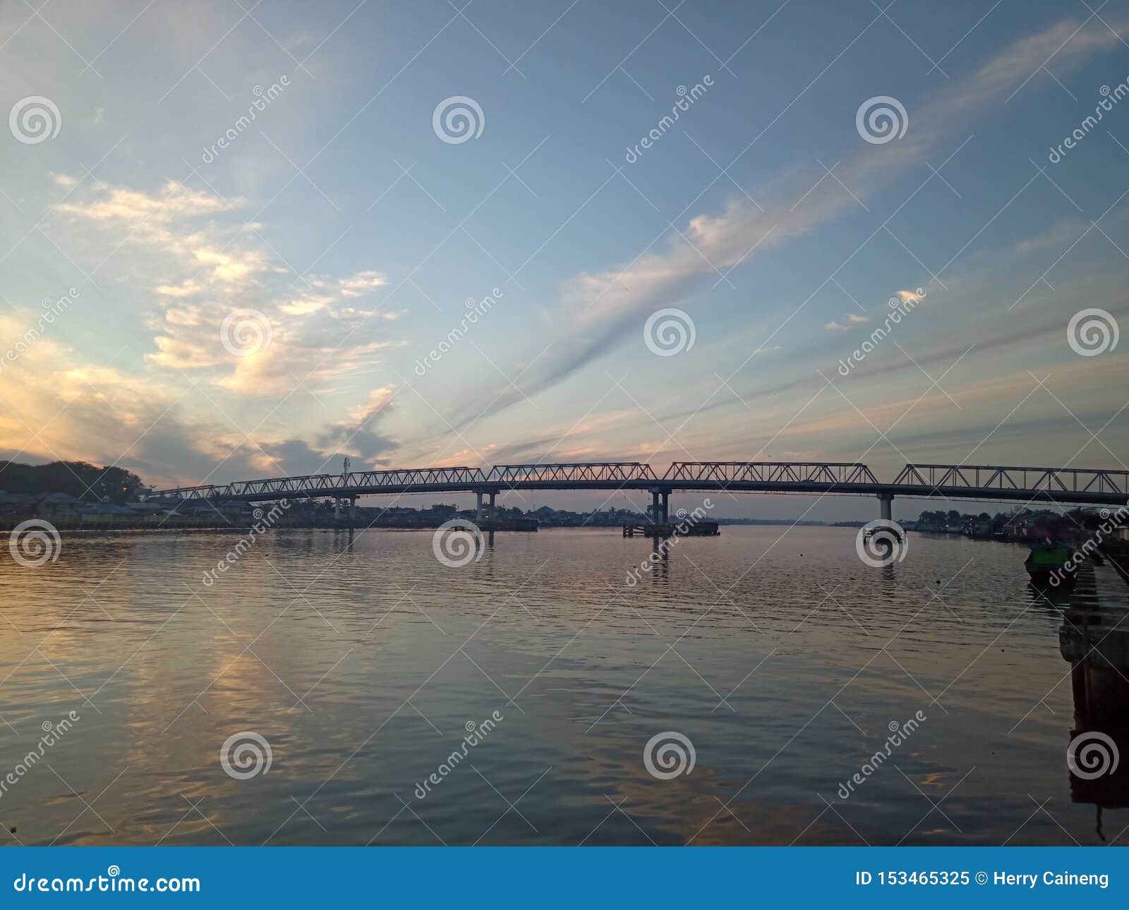 The Sky when the Sun Will Rise in the River with the Bridge Stock Image ...