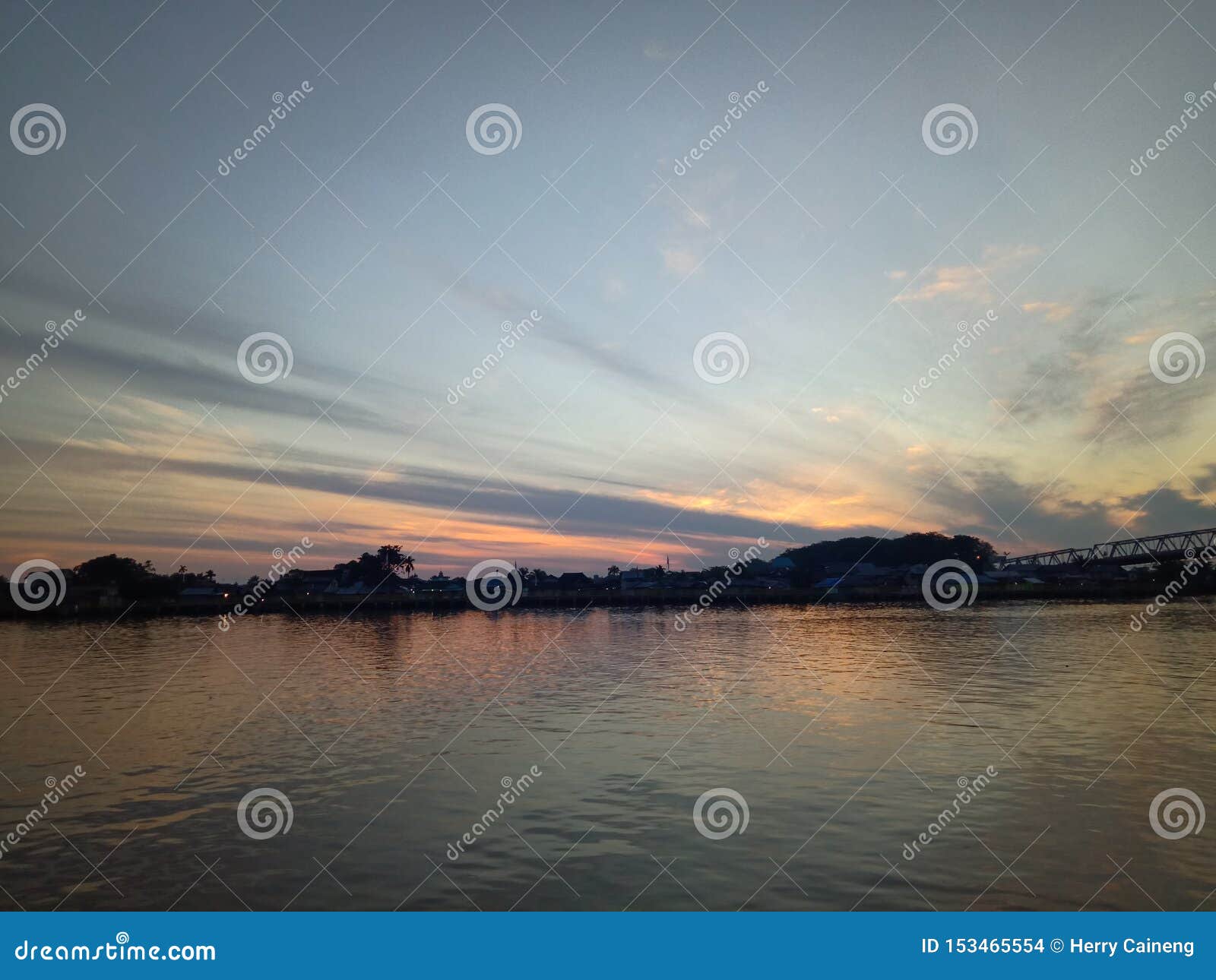 The Sky when the Sun Will Rise in the River with the Bridge Stock Photo ...