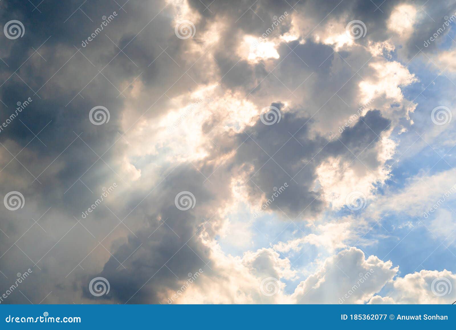 The Sky with Sunlight Shining through the Rain Clouds Stock Image ...