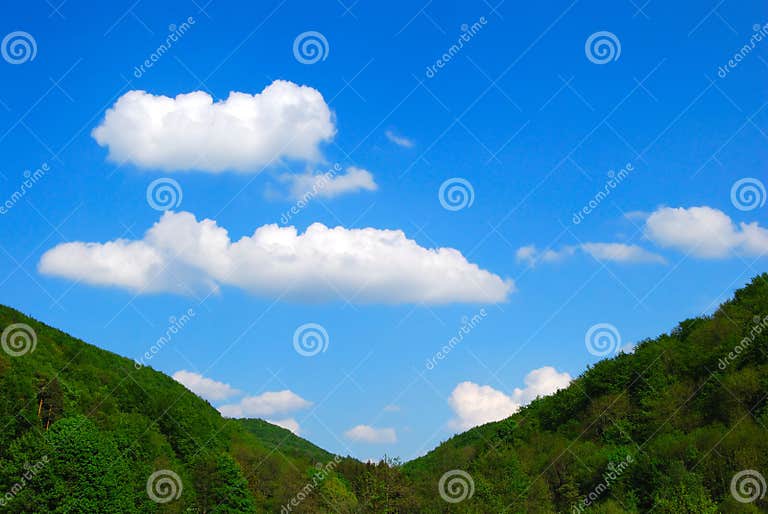 Sky between two hills stock image. Image of environmental - 5219929