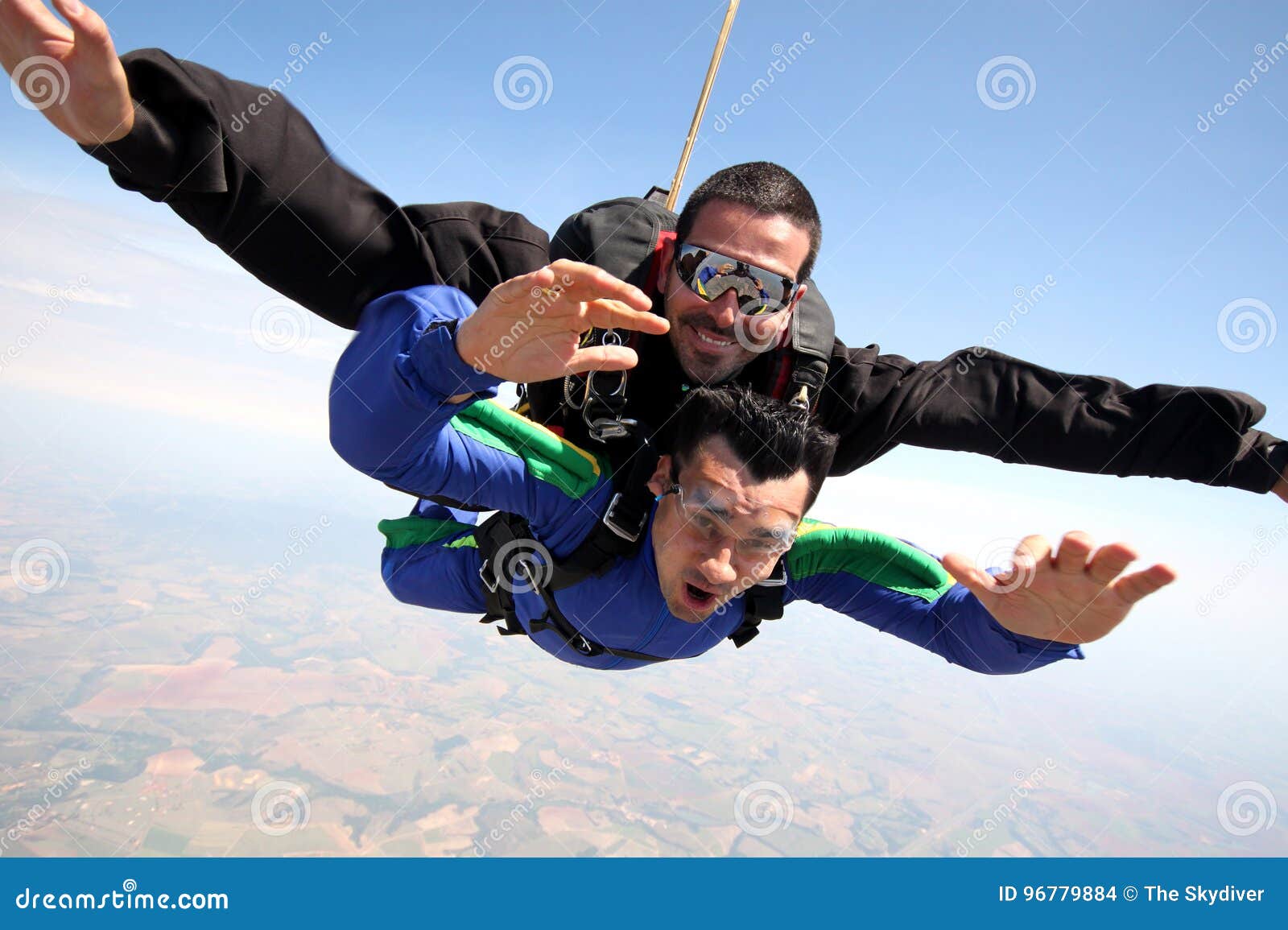 Skydive tandem friends stock photo. Image of parachute - 96779884