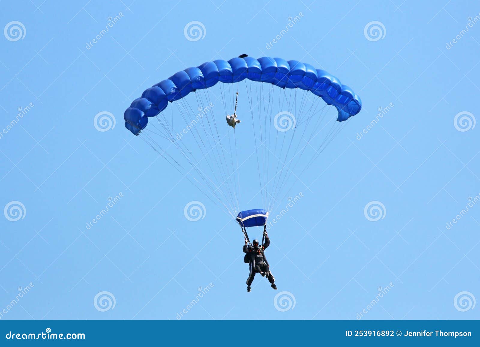 Skydiver Flying Wing in a Blue Sky Editorial Photography - Image of ...