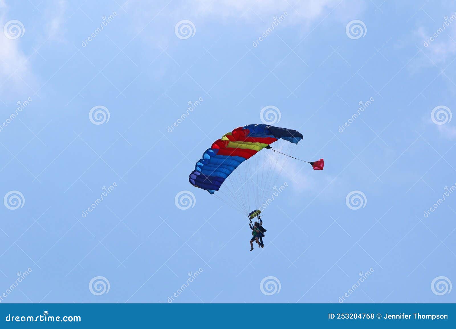 Skydiver Flying Wing in a Blue Sky Stock Photo - Image of skydiver ...