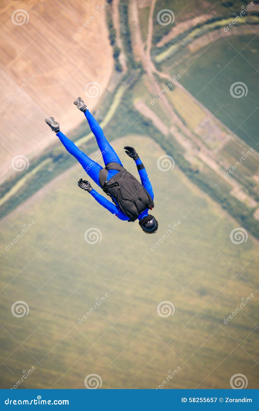 Skydiver in free stock image. Image of danger, paratrooper - 58255657