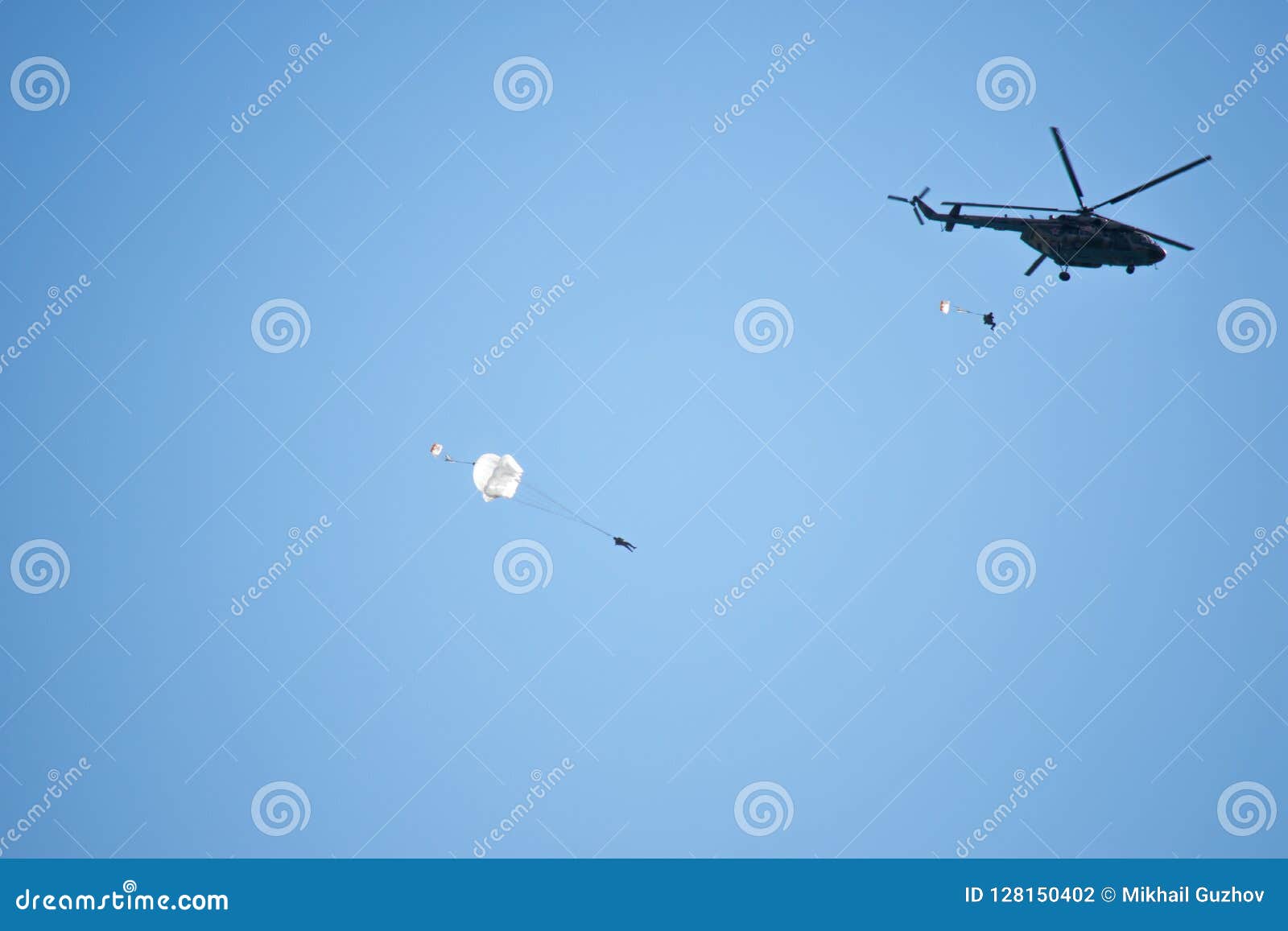Skydiver Jumping from a Helicopter at High Altitude Stock Photo - Image ...