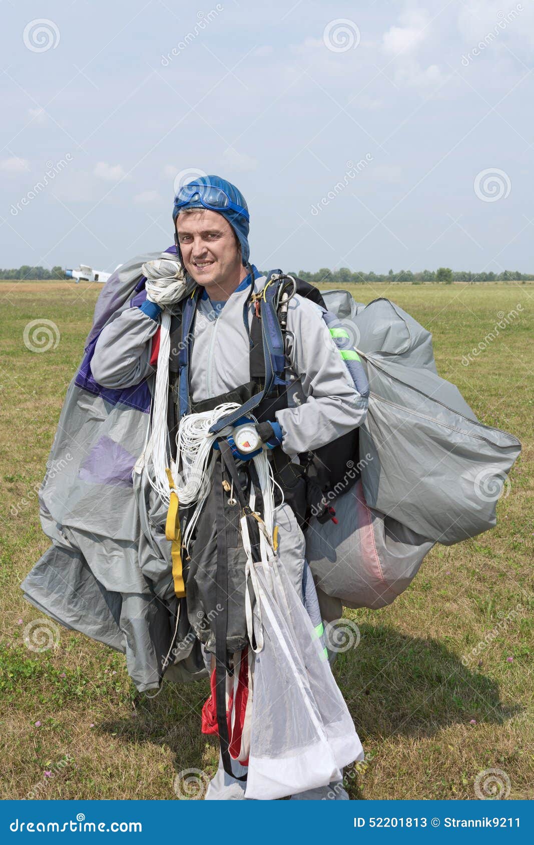 Skydiver after landing. stock image. Image of high, airfield - 52201813