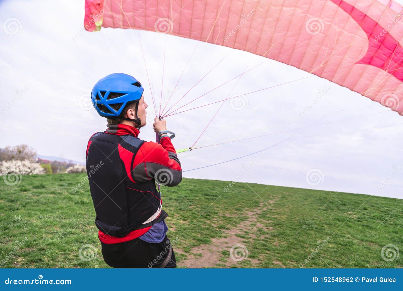 Skydiver Pulls Parachute Behined Him after Landing Stock Photo - Image ...
