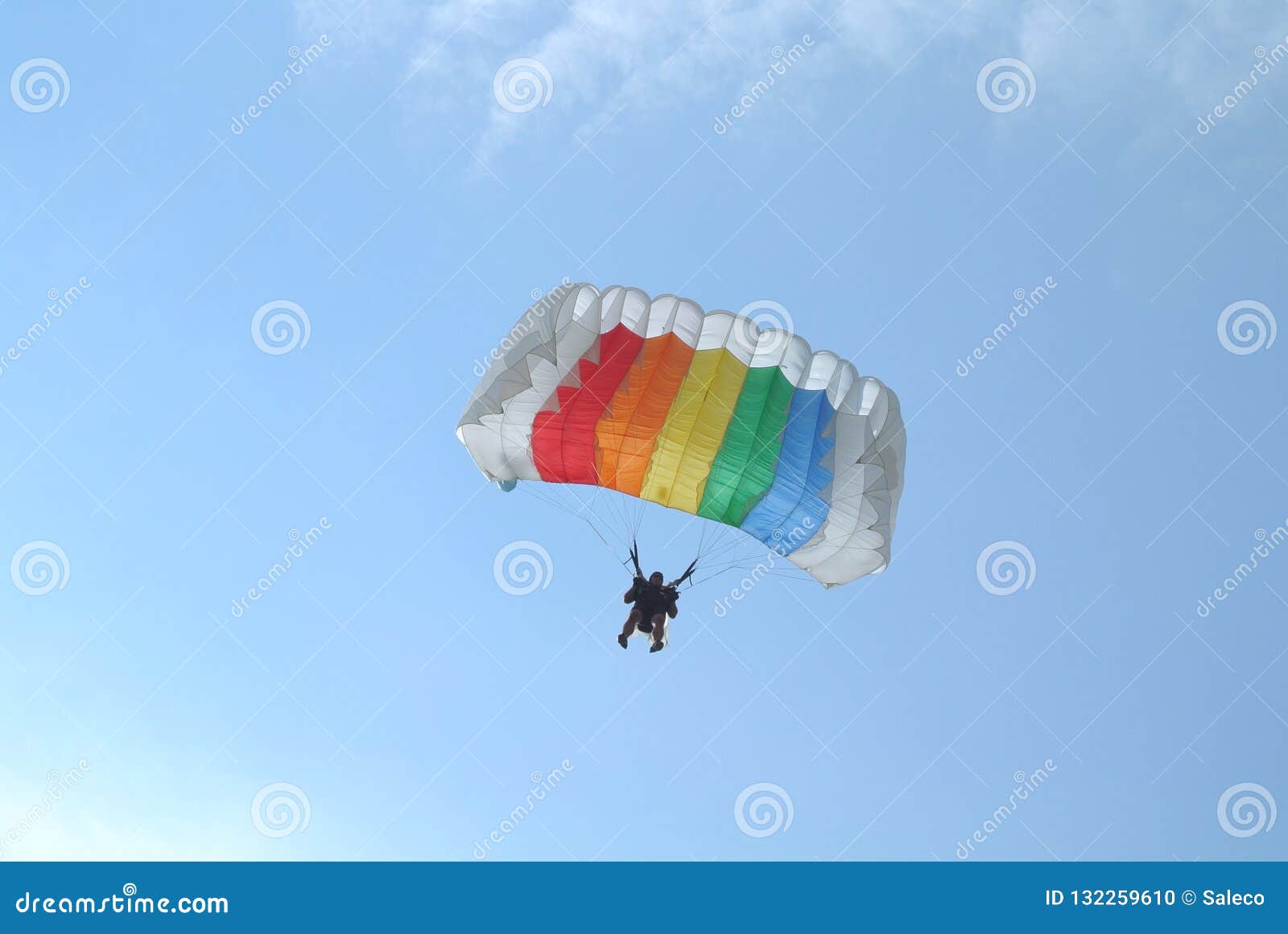 Skydiver Skydiving with Colourful Parachute in Rainbow Colours ...
