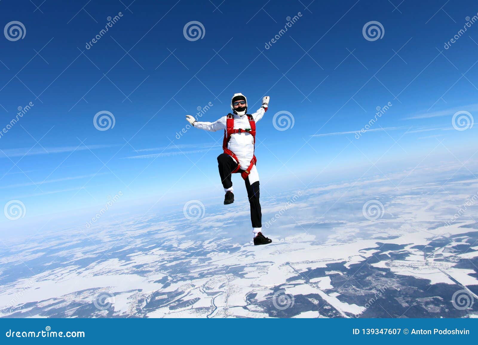 Alone Skydiver is Falling Above Snowy Ground. Stock Image - Image of ...