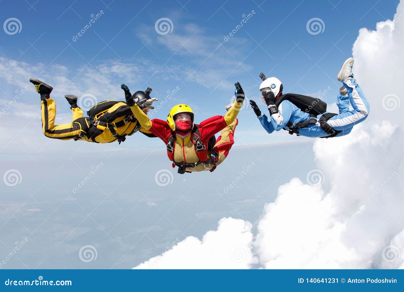 Skydiving. Two Instructors are Training a Student To Fly. Stock Image ...