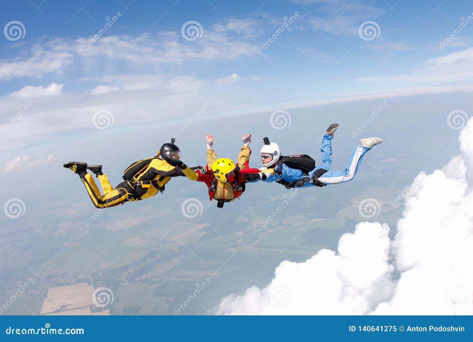 Skydiving. Two Instructors are Training a Student To Fly. Stock Image ...