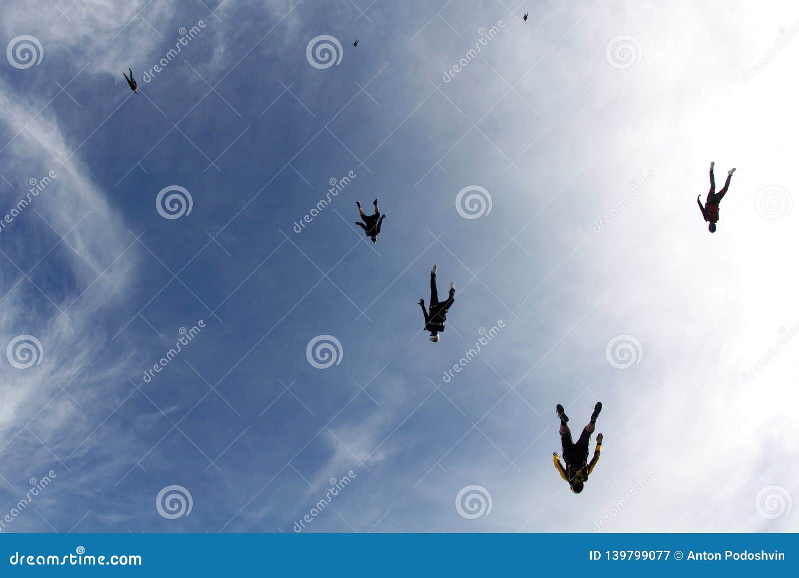 Skydiving. a Flock of Skydivers is in the Blue Sky. Stock Image - Image ...