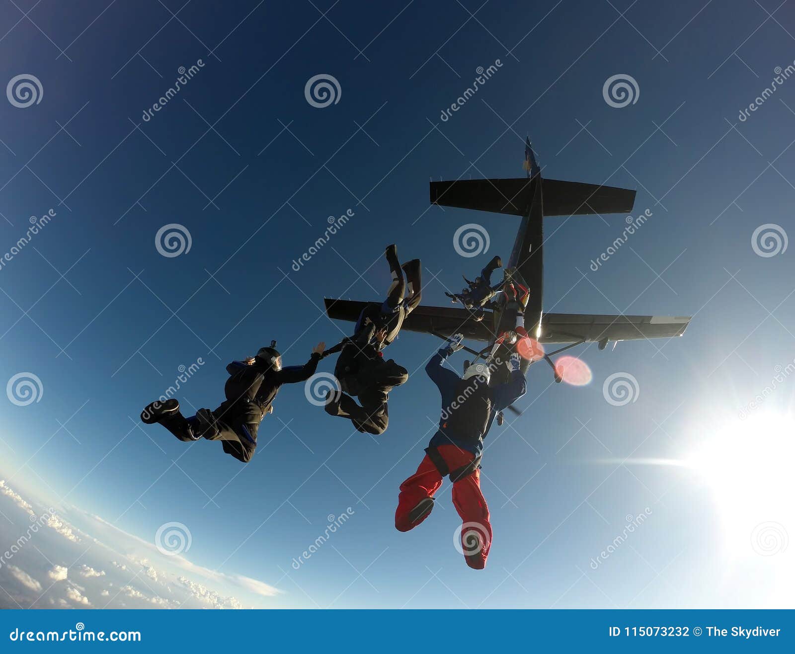 Skydiving group formation editorial photography. Image of building ...