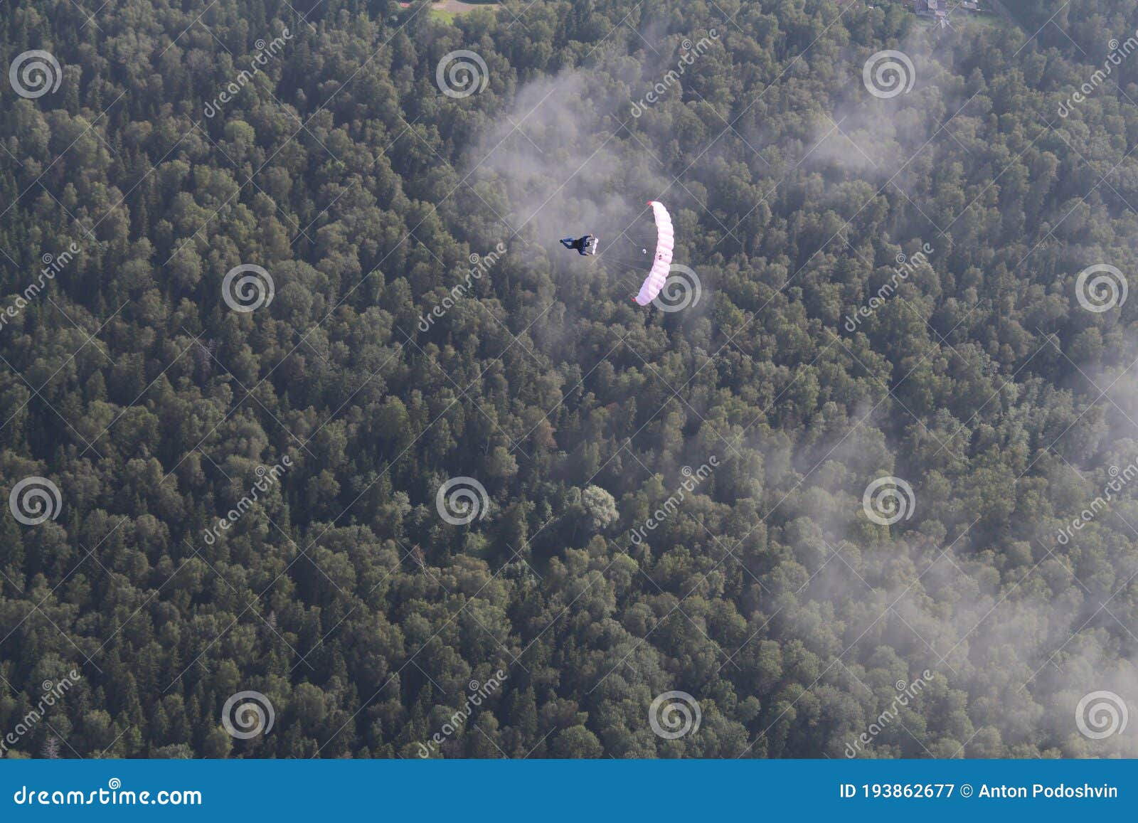 Skydiving. a Parachute is Above the Ground. Stock Image - Image of ...