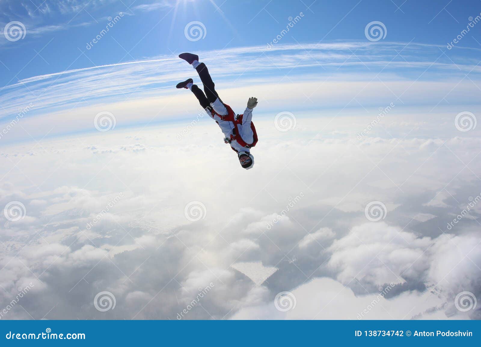 Skydiving. Skydiver is Falling Above Clouds. Stock Photo - Image of ...