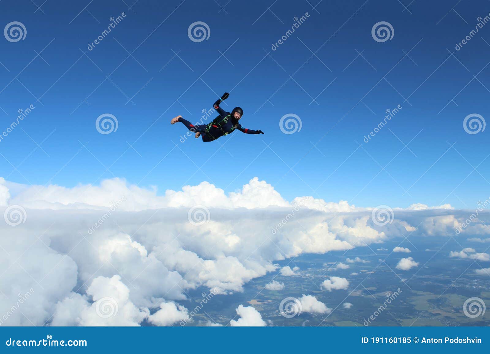 Skydiving. a Skydiver is Flying in the Sky. Stock Image - Image of ...