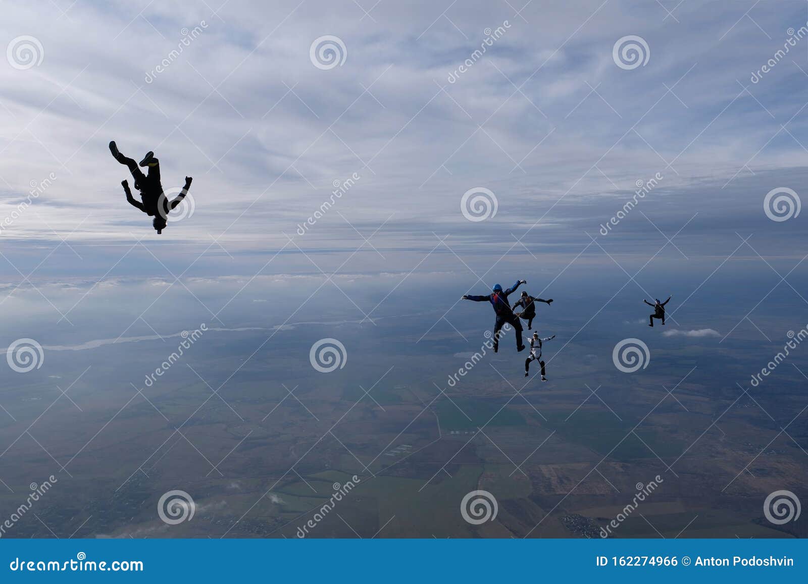 Skydiving. Skydivers are Having Fun in the Cloudy Sky. Stock Photo ...