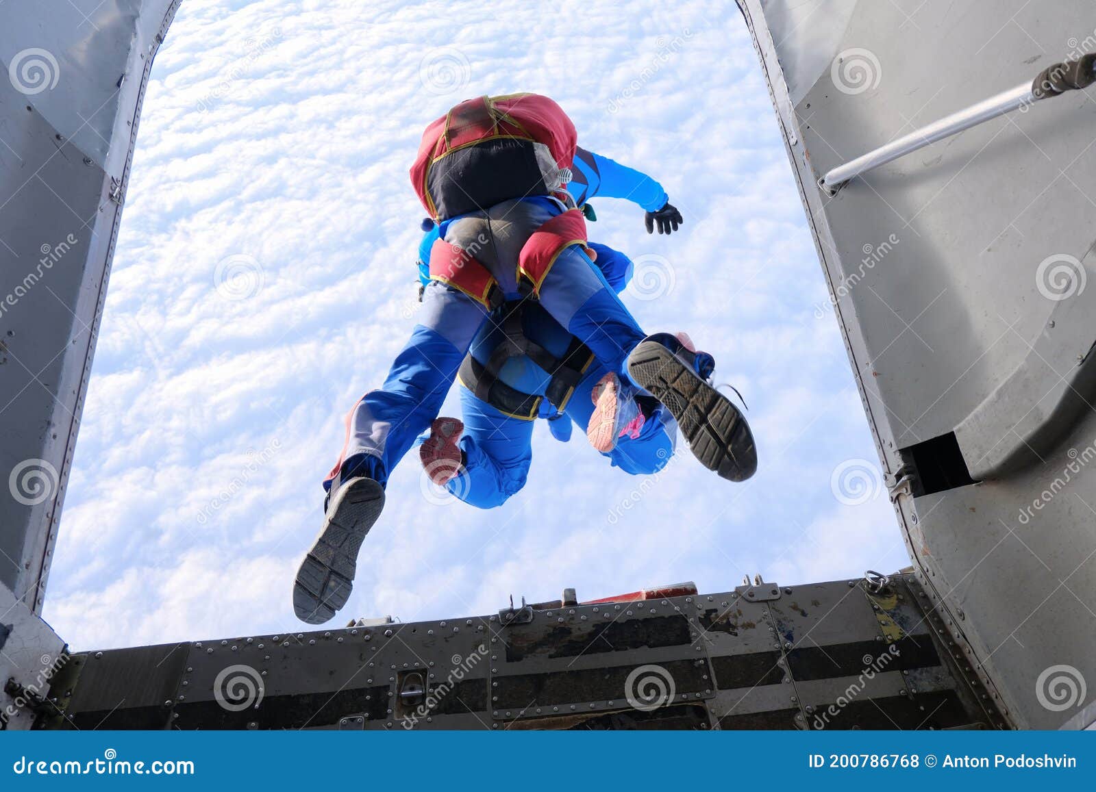 Skydiving. Tandem Jump. First Step into the Sky. Stock Photo - Image of ...
