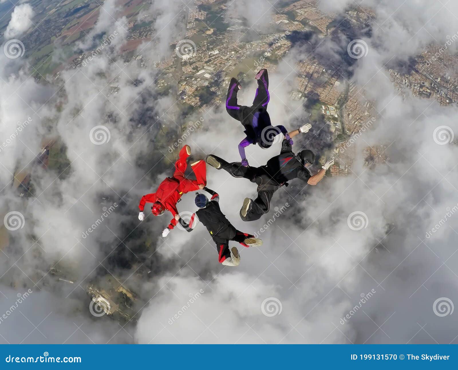 Skydiving 4 Way Team Above the Clouds. Stock Photo - Image of focus ...