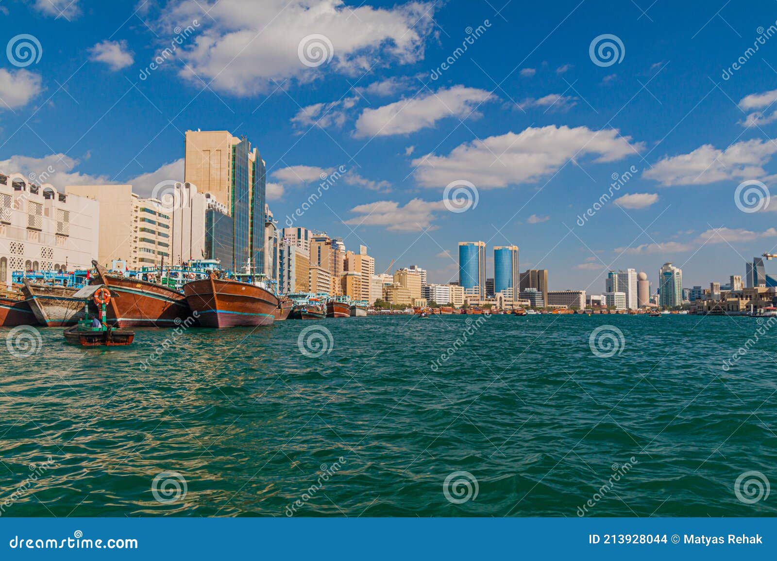 Skyline Of Deira, Dubai During Sunset With Dubai Creek, Mosque Minaret ...