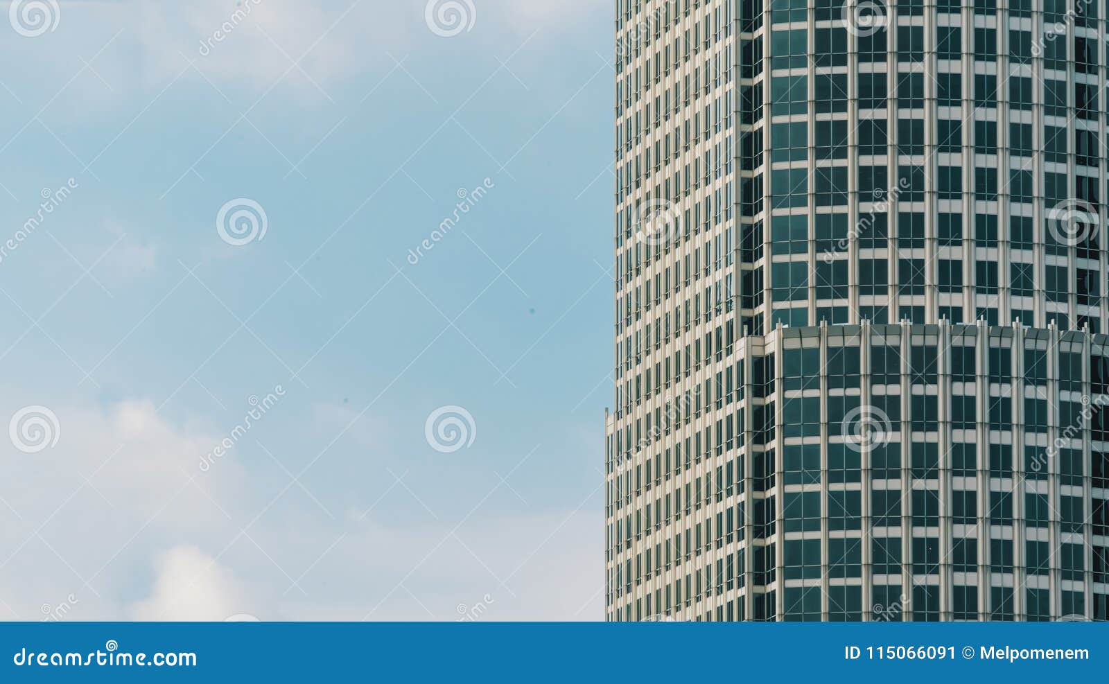 Skyscraper Against a Blue Sky Background Stock Image - Image of clouds ...