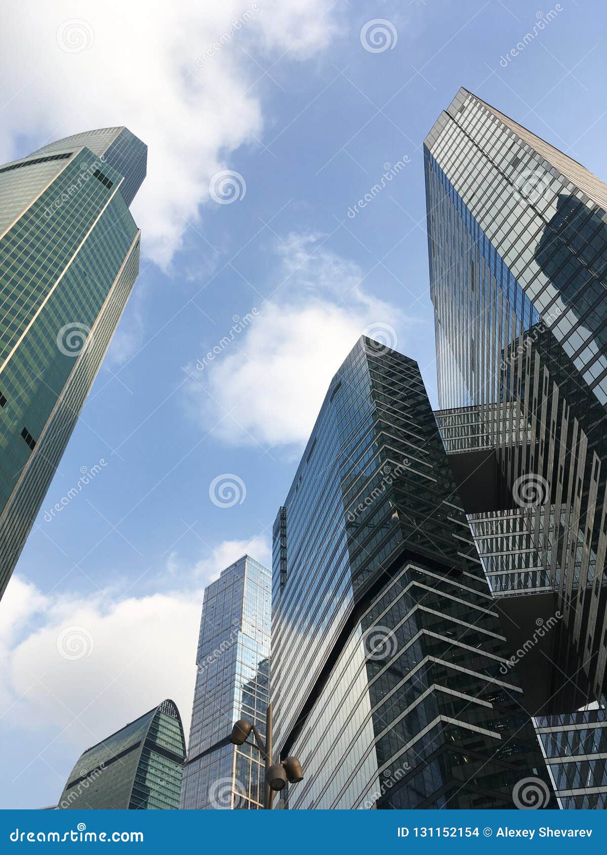 Skyscraper on a Background of Blue Sky Bottom View Stock Photo - Image ...