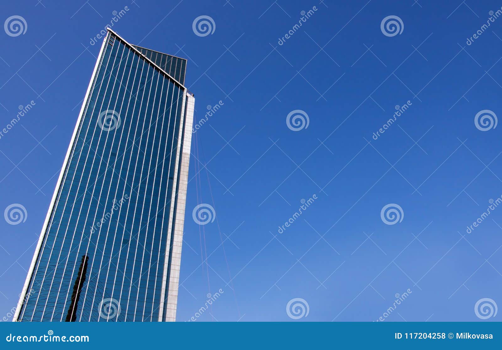Skyscraper on a Background of Blue Stock Photo - Image of structure ...
