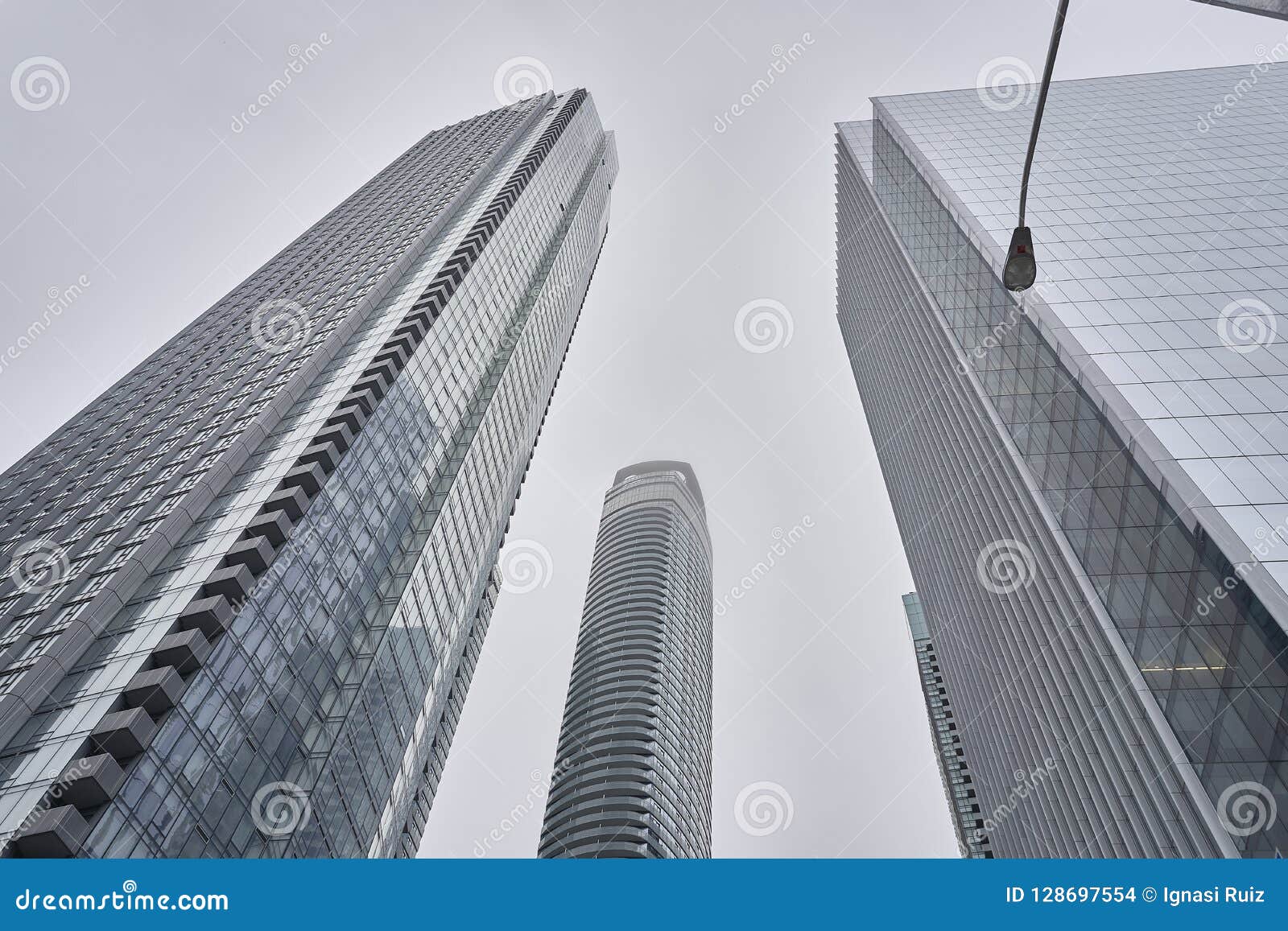 Skyscraper from below stock photo. Image of light, skyline - 128697554