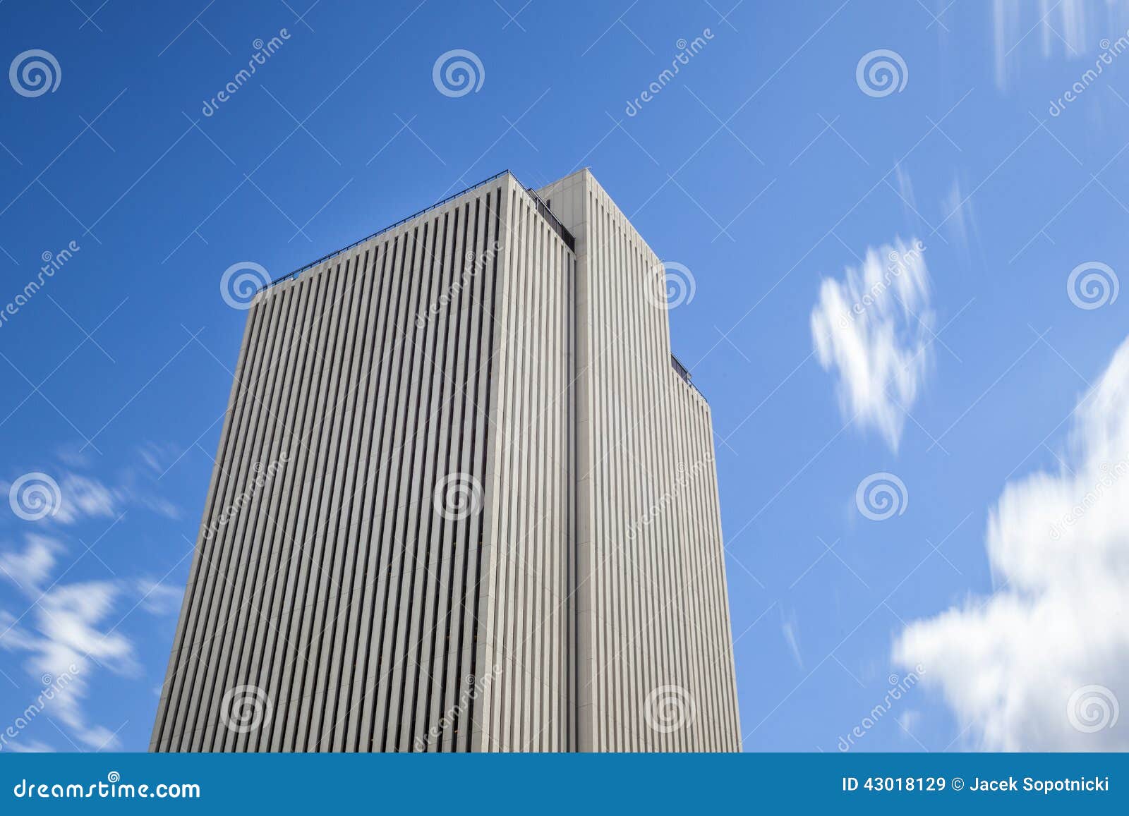 Skyscraper and Blue Sky with Clouds in the Move Stock Image - Image of ...