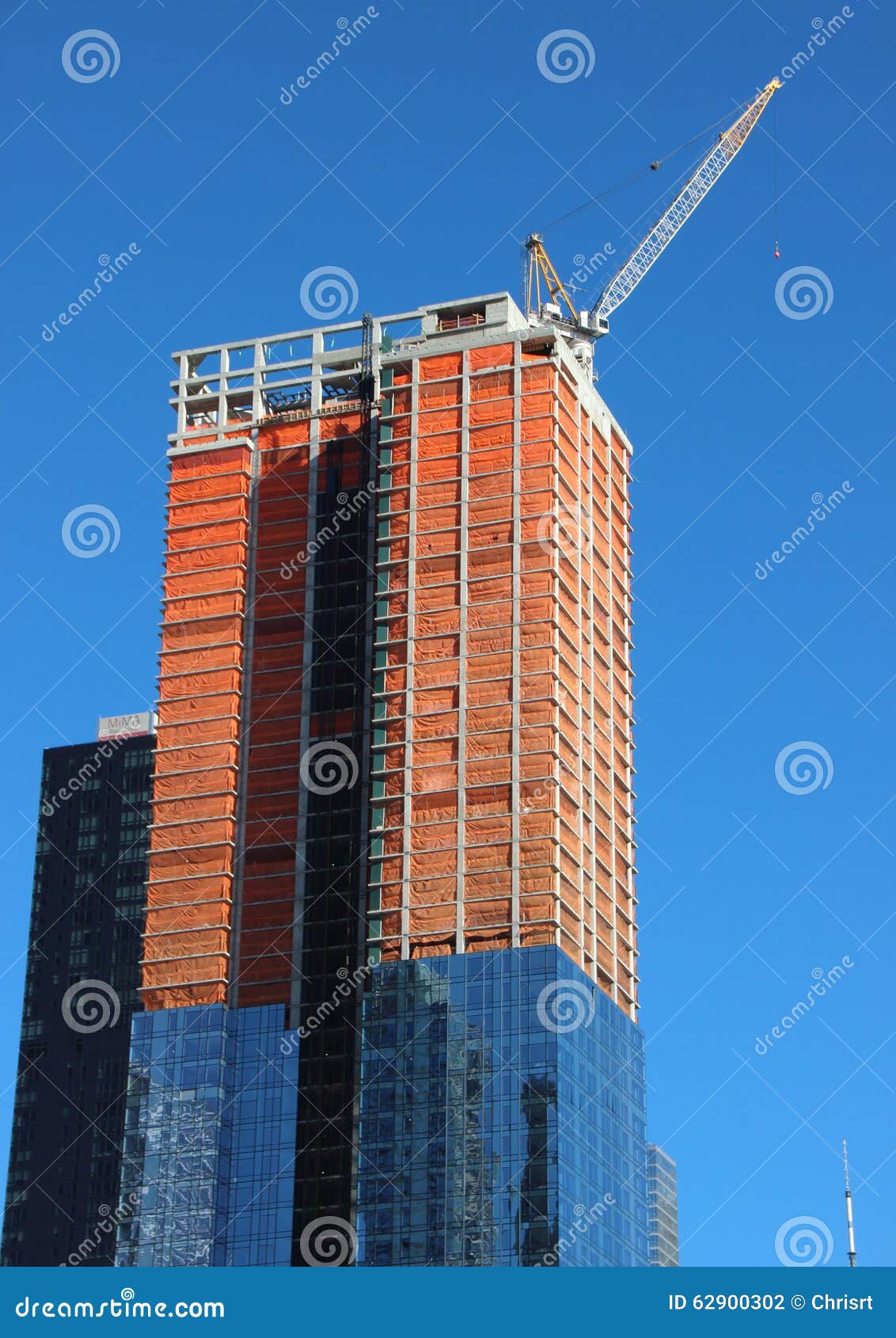 Skyscraper Building Site Half Completed with Top Crane Stock Photo ...