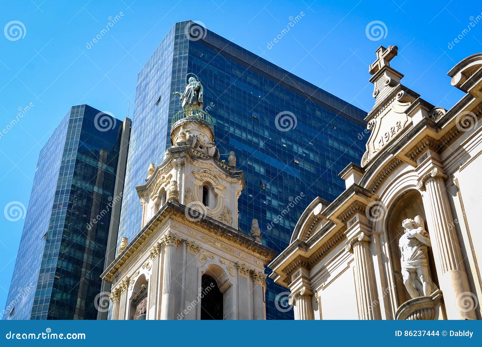 Skyscraper and Church stock photo. Image of tower, blue - 86237444