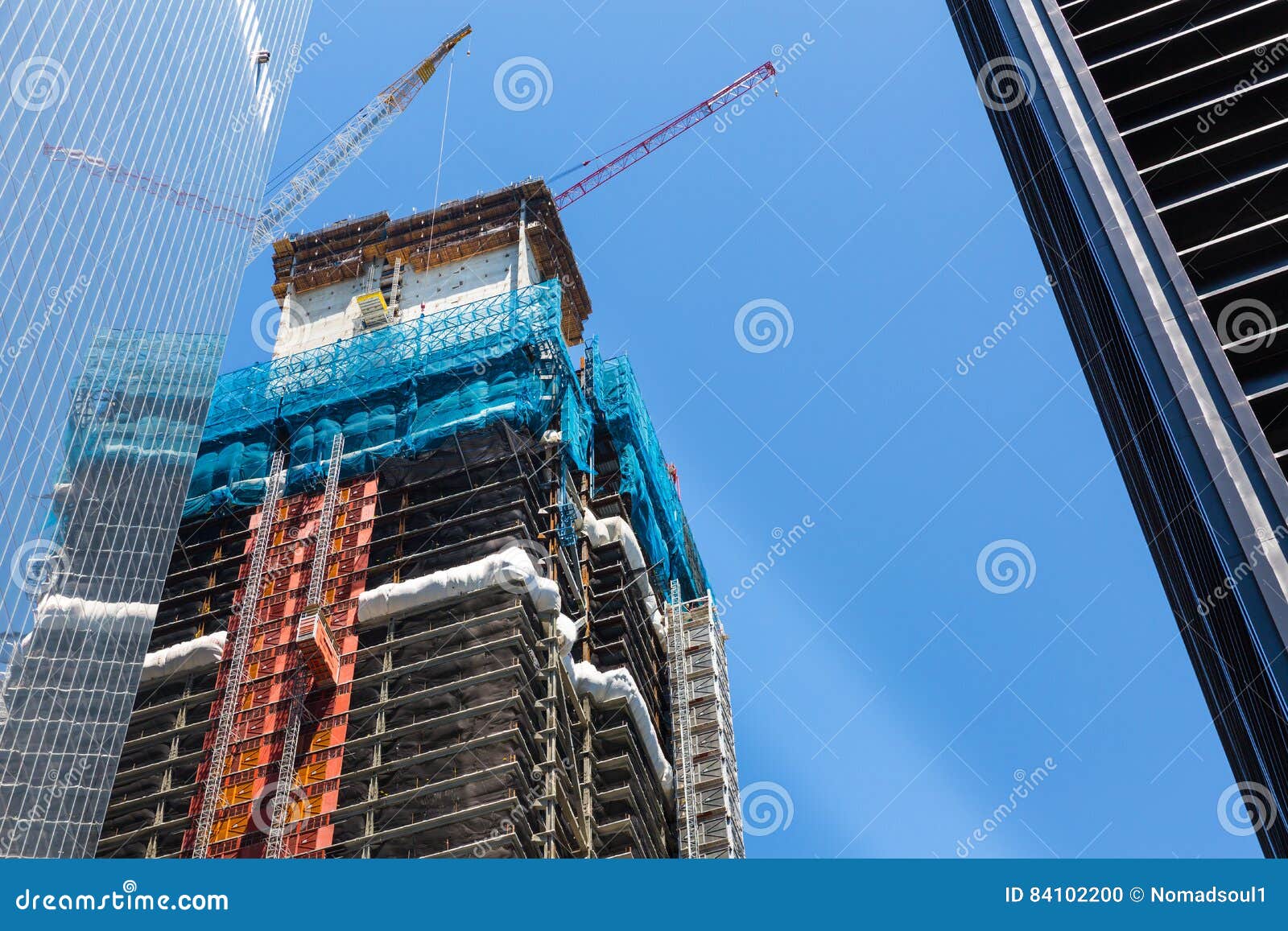 Skyscraper Construction with Crane on the Roof. Stock Photo - Image of ...