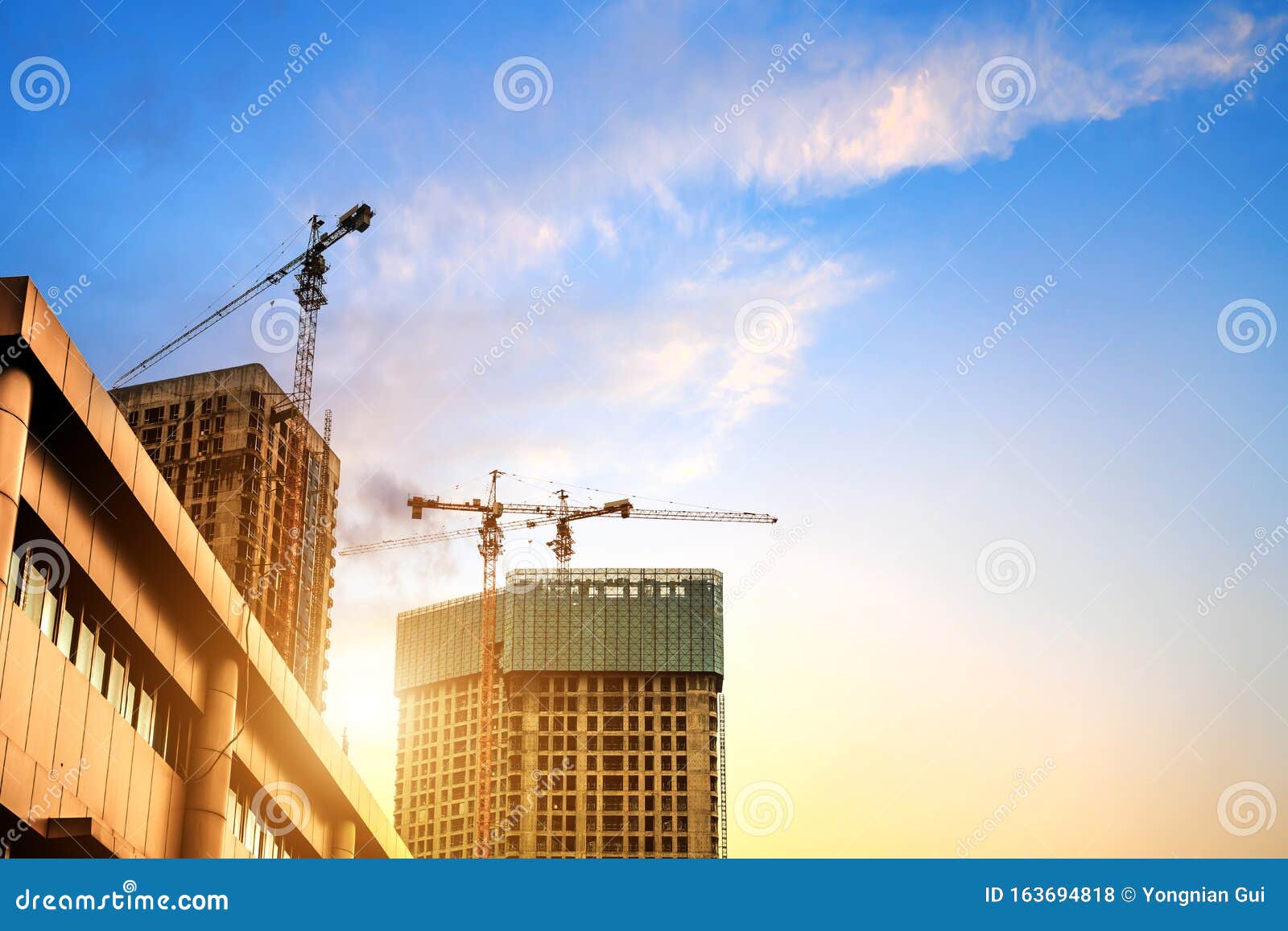 Skyscraper Construction Site Stock Photo - Image of economy, blue ...