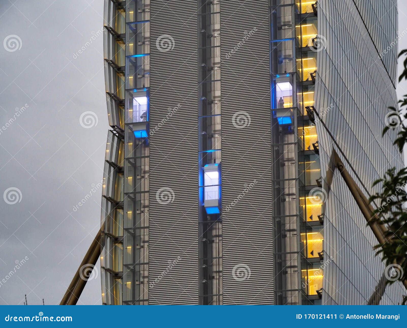 Skyscraper External Elevator with Persons Silhouette Inside Stock Image ...