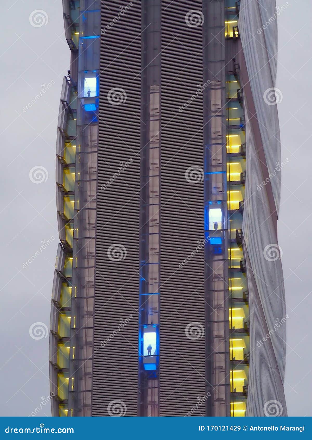 Skyscraper External Elevator with Persons Silhouette Inside Stock Image ...