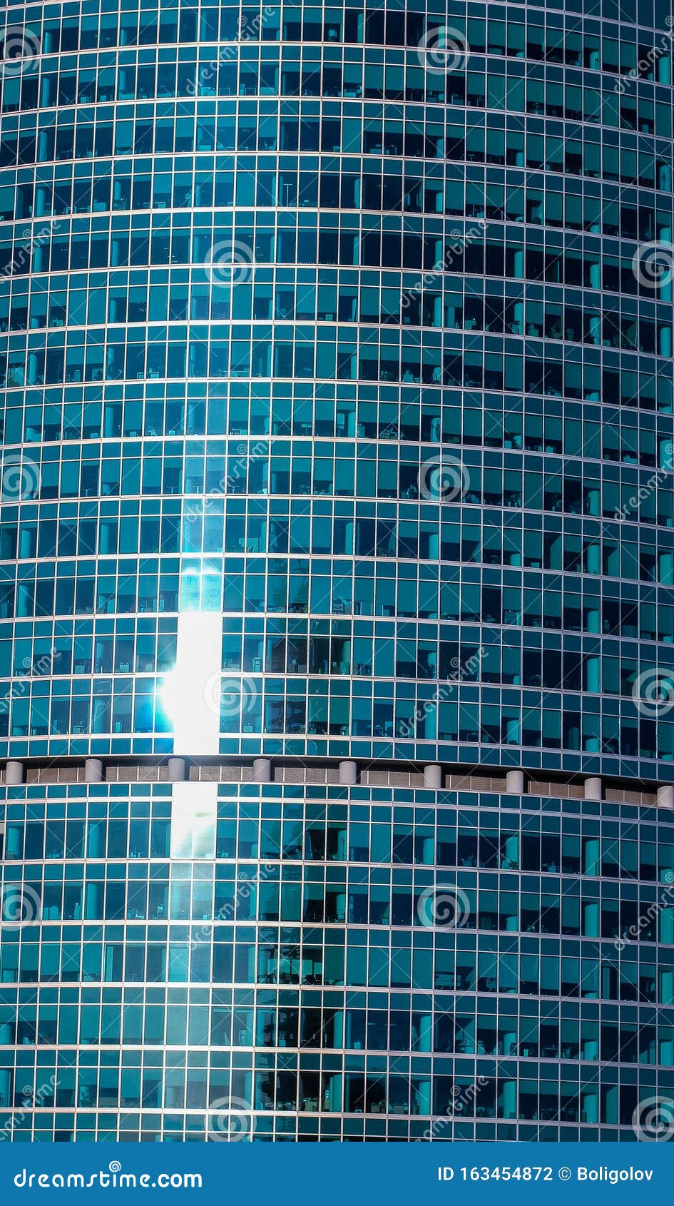 Skyscraper Glass Windows Illuminated with Bright Sun Light Stock Photo ...