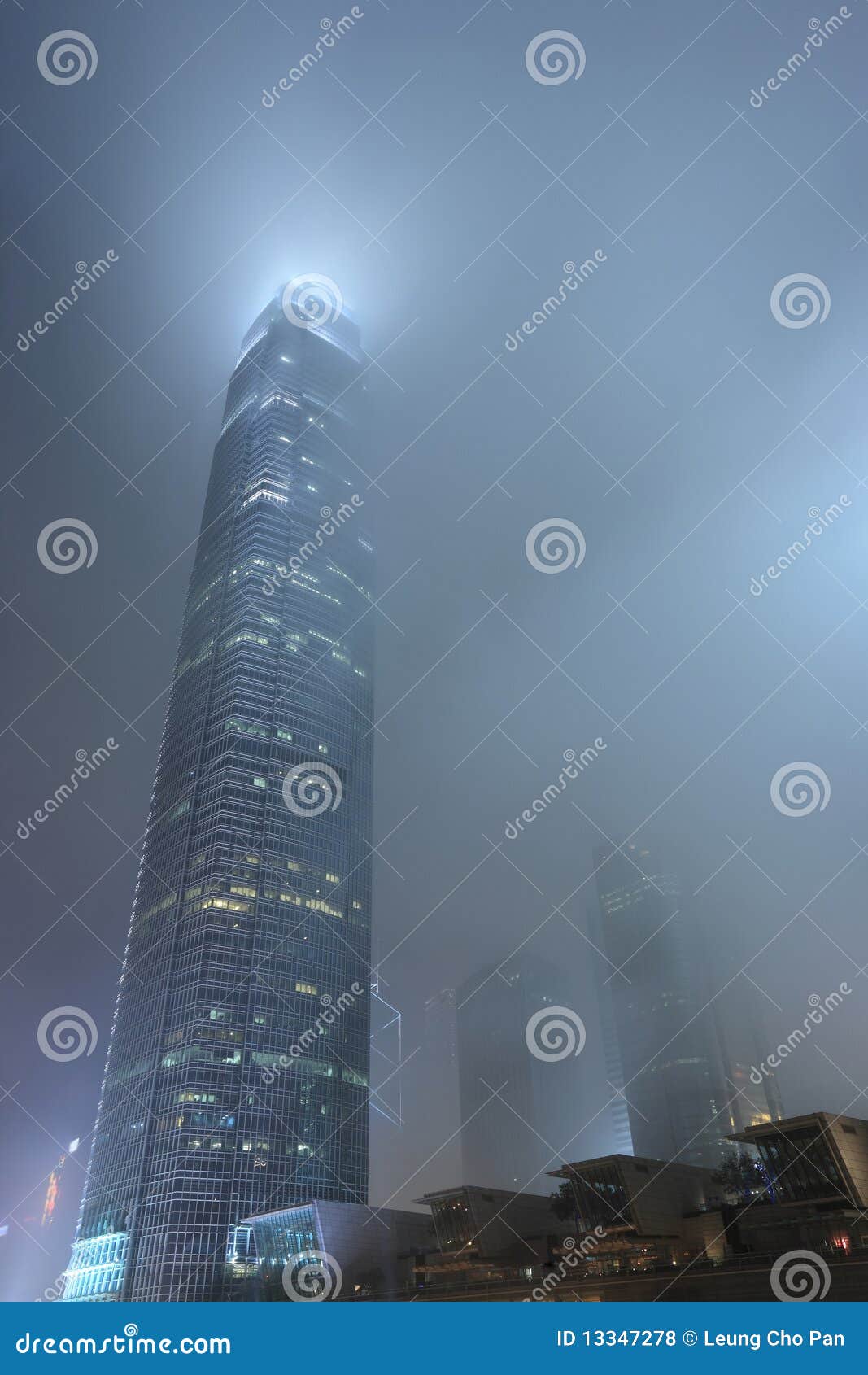 Skyscraper in mist stock photo. Image of cityscape, cloudy - 13347278