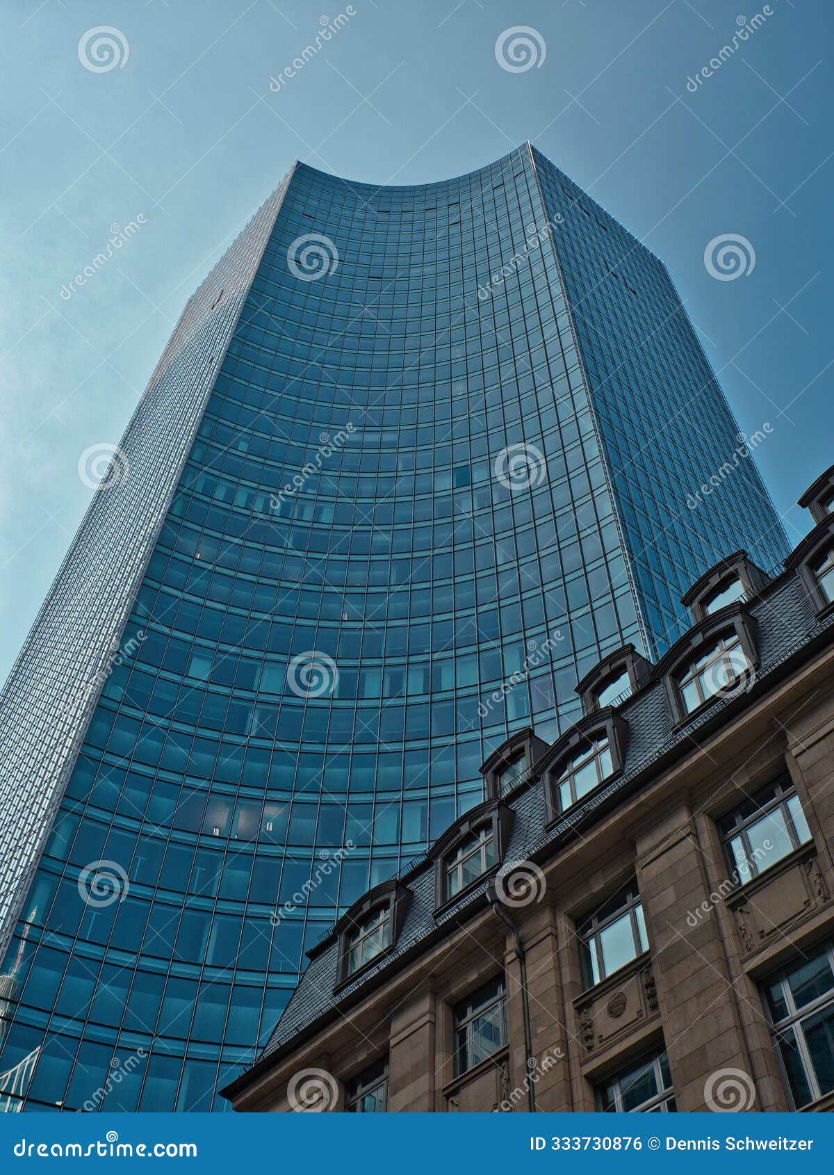Skyscraper Photographed from Below with Its Own Historic Building in ...
