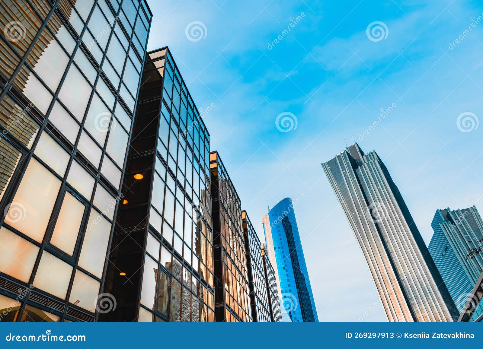 The Skyscraper is Reflected in the Windows of the Facade of a Modern ...