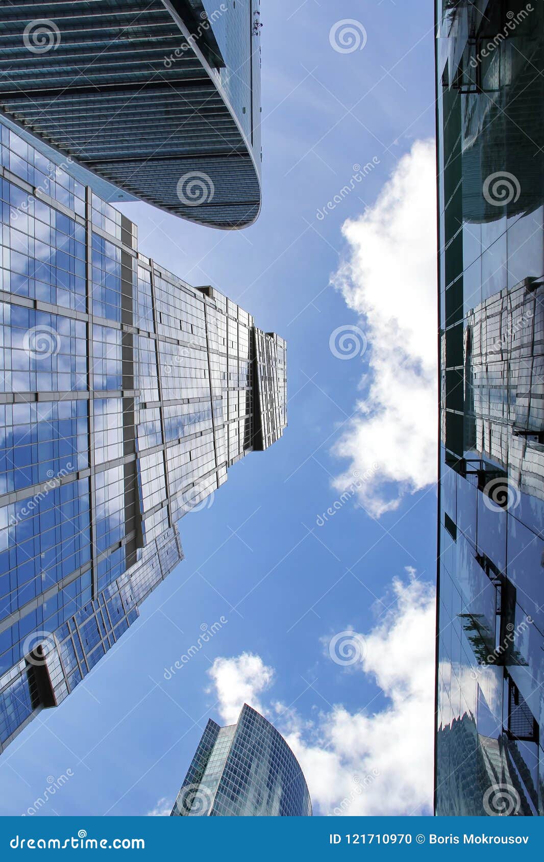 The Skyscraper with the Reflection of the Blue Sky in the Windows Stock ...