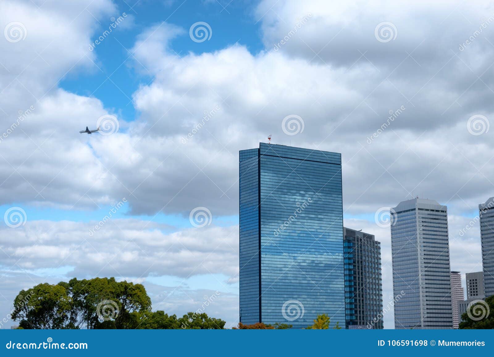 Skyscraper Reflection Cloud in Downtown and Airplane Flying on B Stock ...
