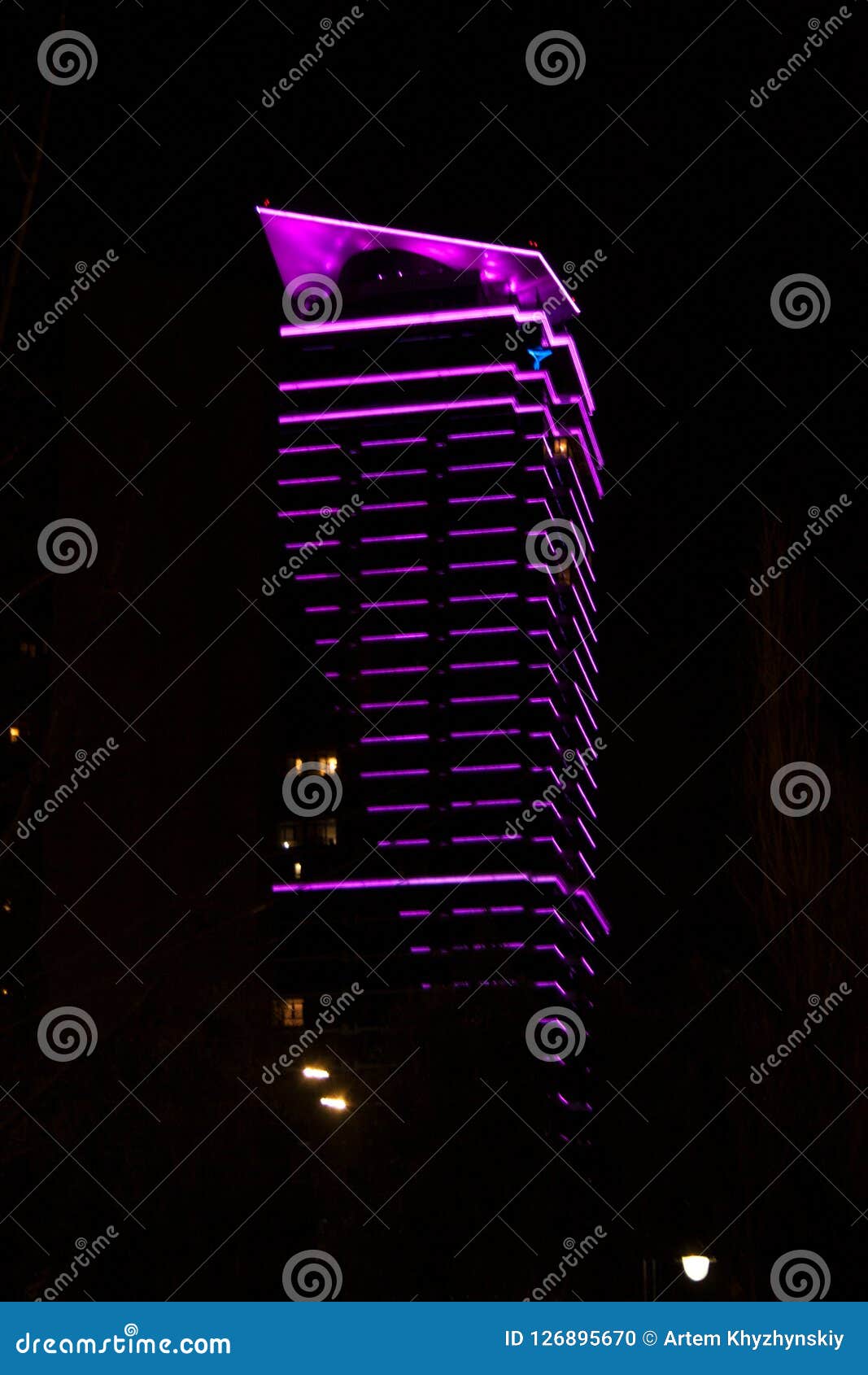 Skyscraper Silhouette Illuminated with Magenta Lines Stock Photo ...