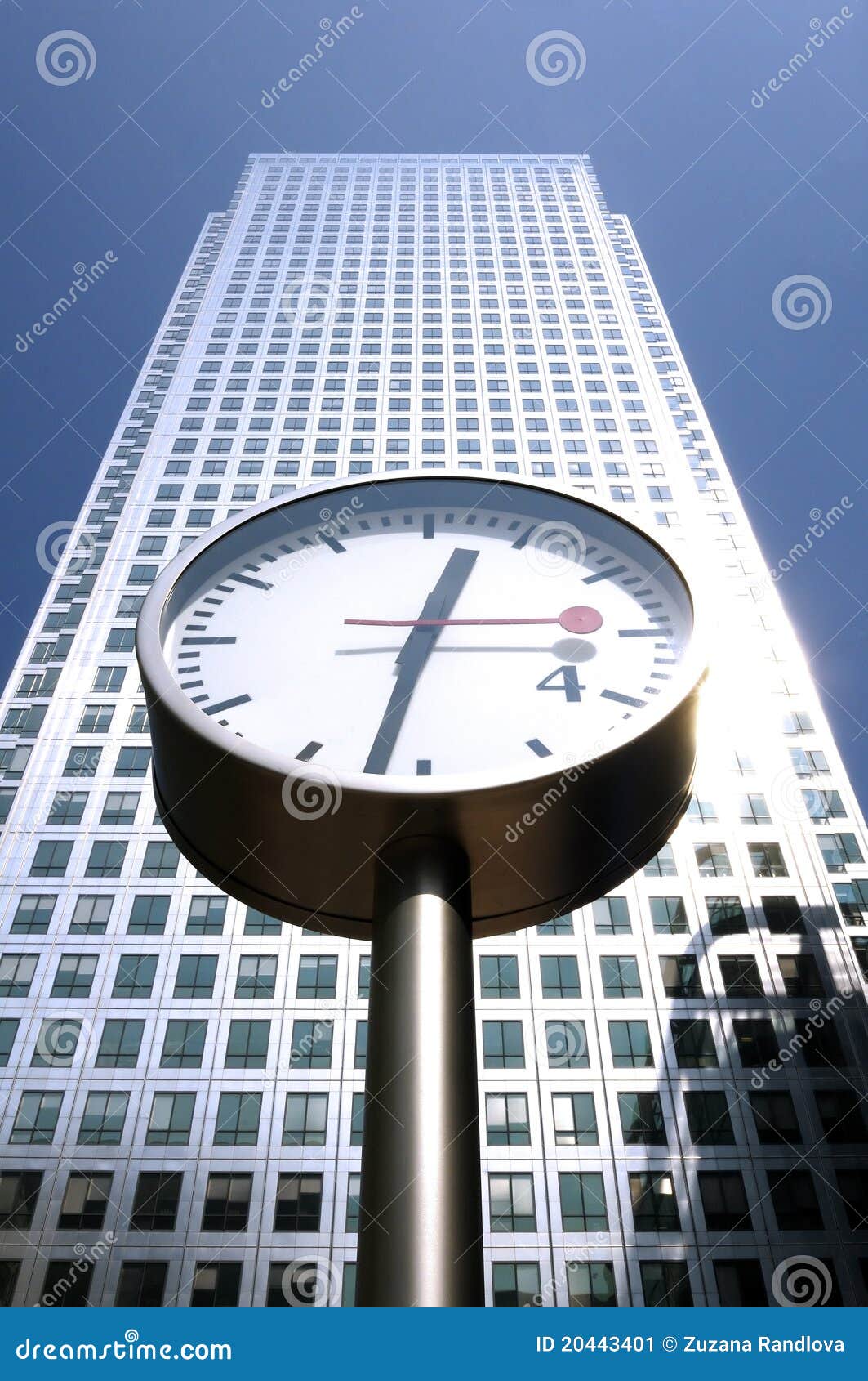 A Skyscraper and Street Clocks Stock Image - Image of metal, glass ...