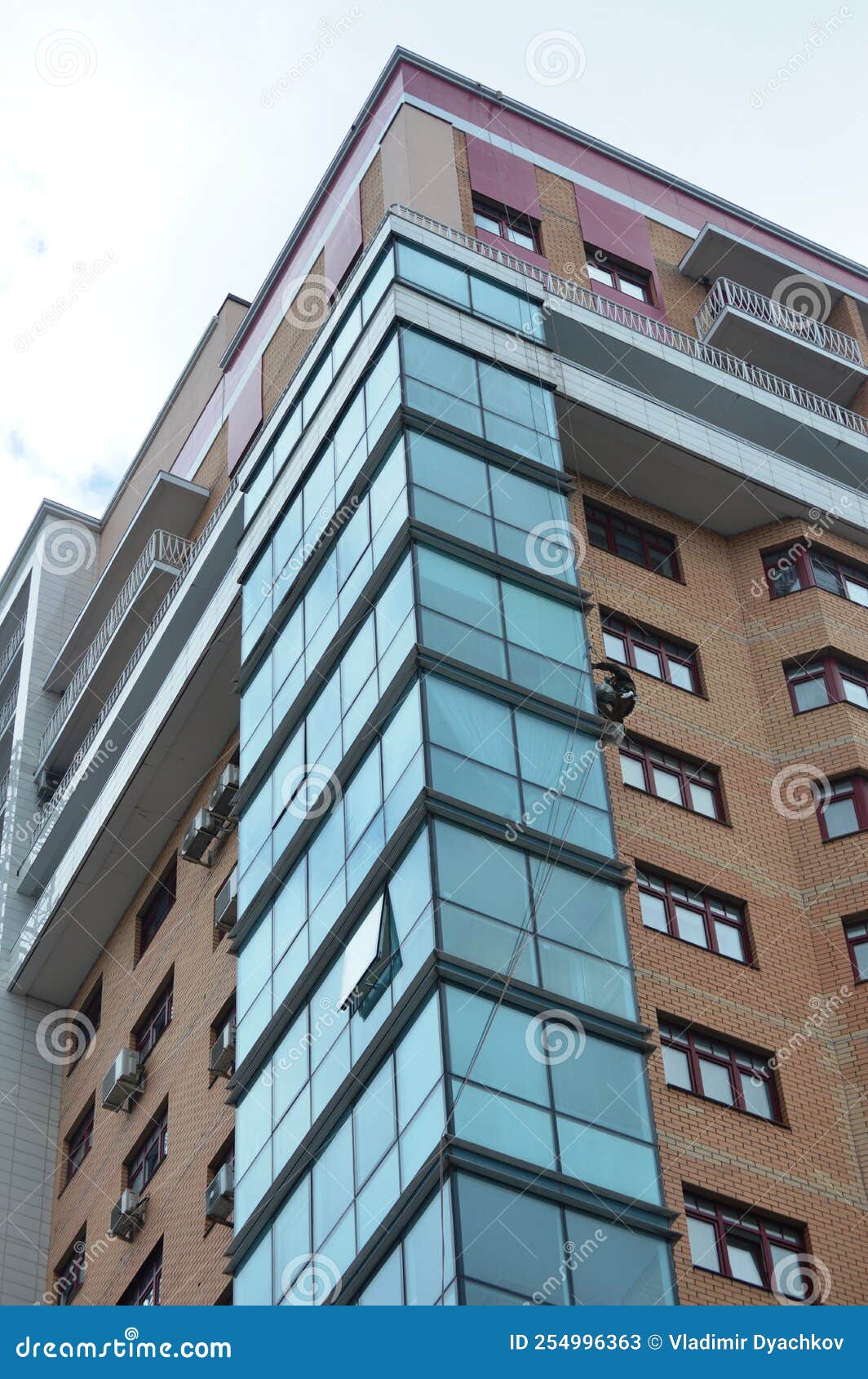 Skyscraper window cleaning stock image. Image of glass - 254996363